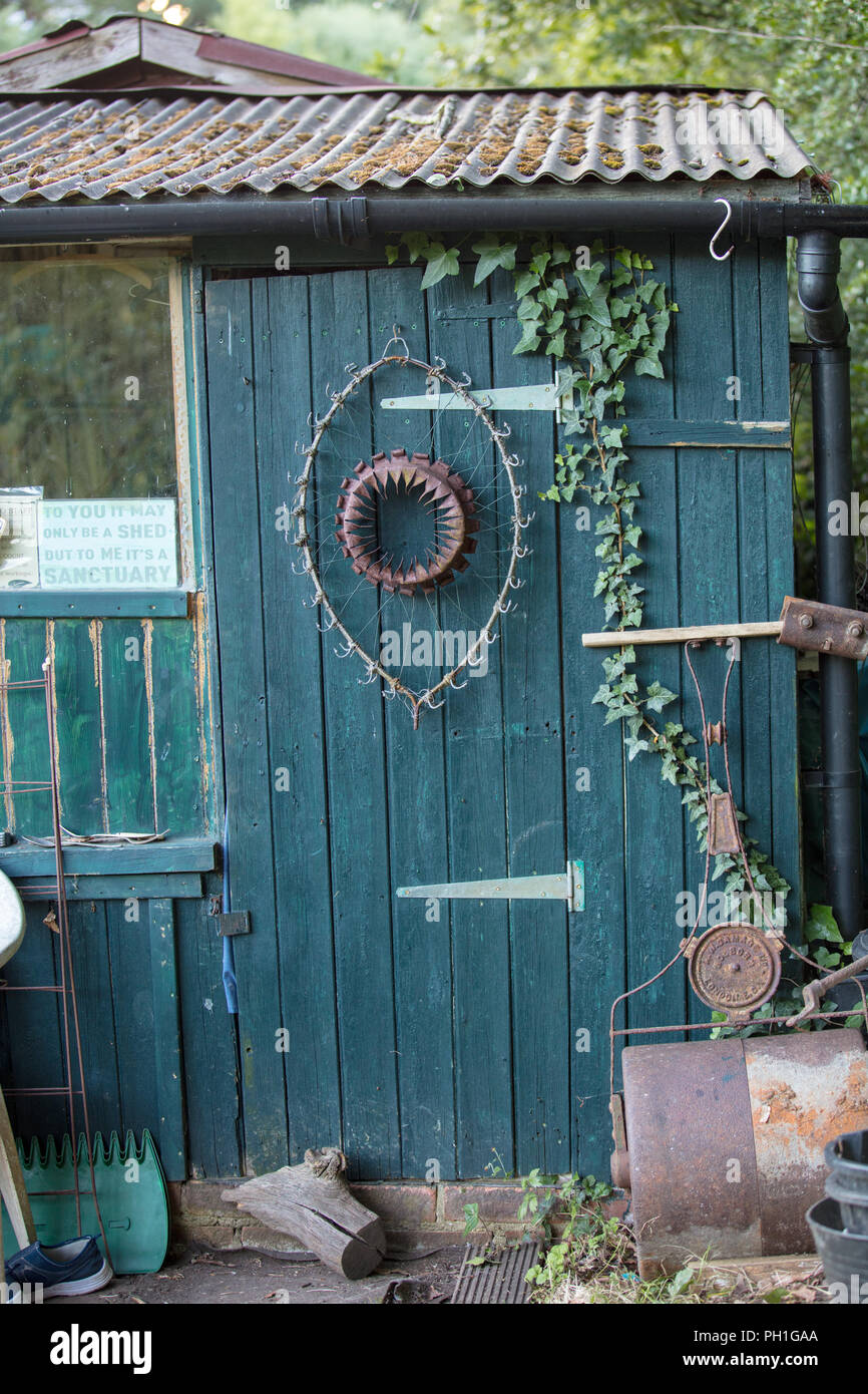 Shed with interesting and creative artefacts and other objects Stock ...