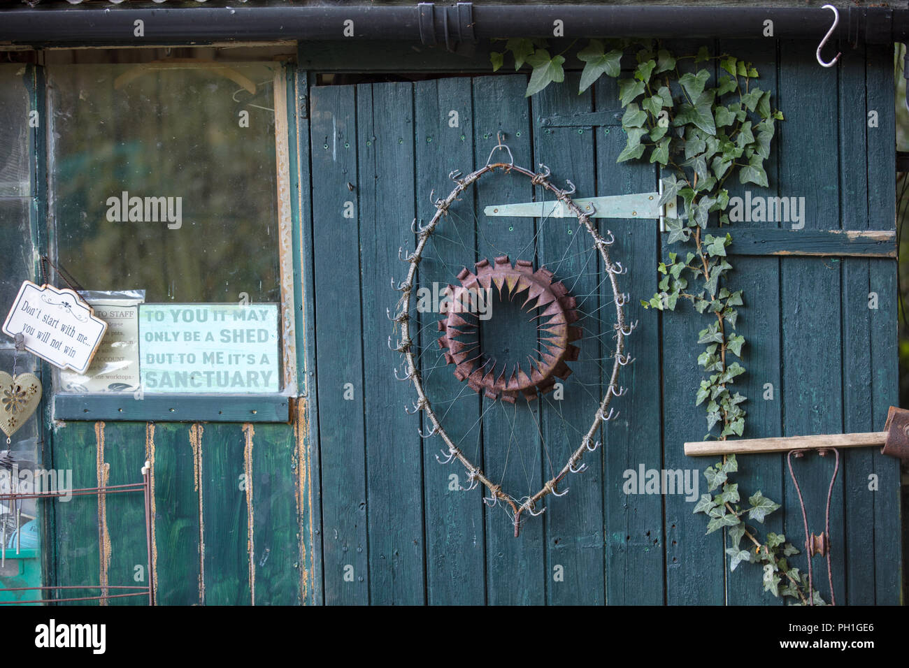 Shed with interesting and creative artefacts and other objects Stock ...