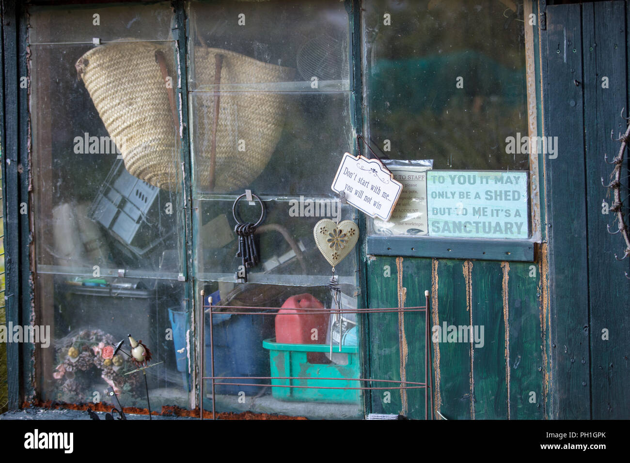 Shed with interesting and creative artefacts and other objects Stock ...