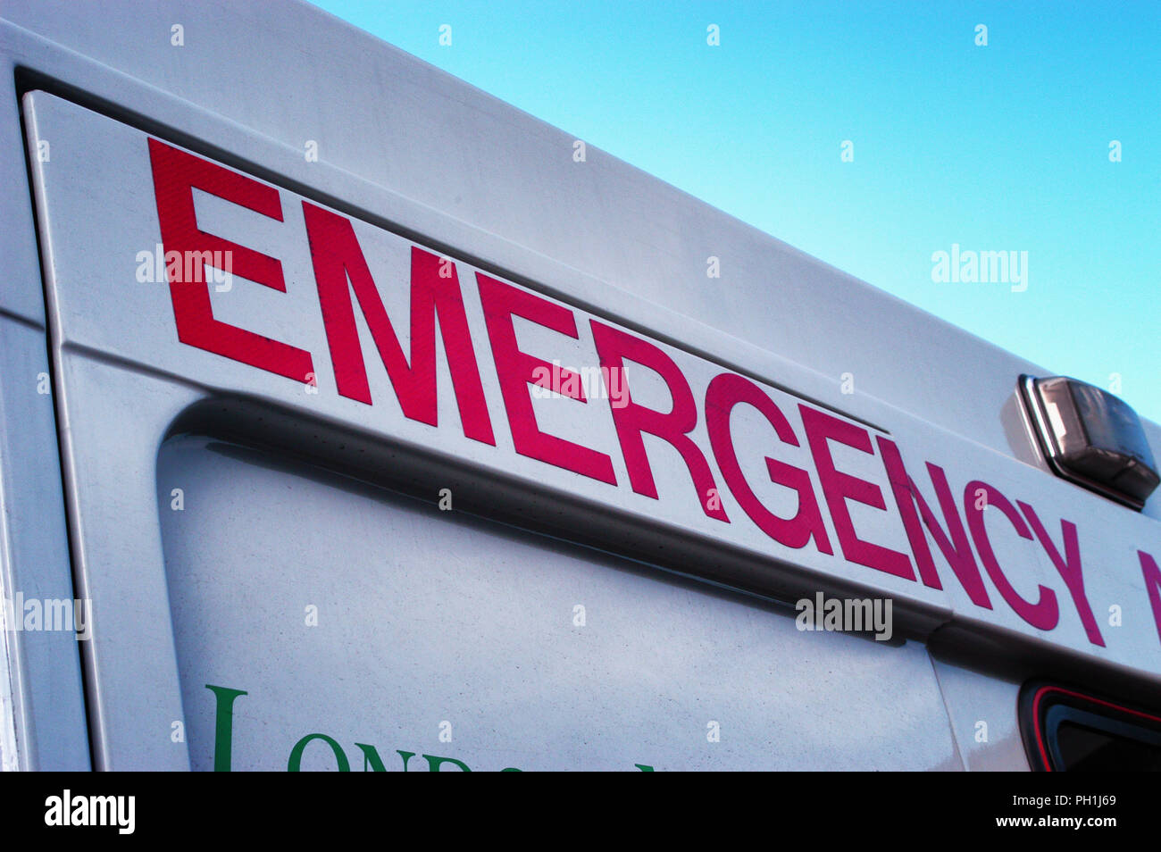 Emergency sign on an ambulance in City area of London, England Stock ...