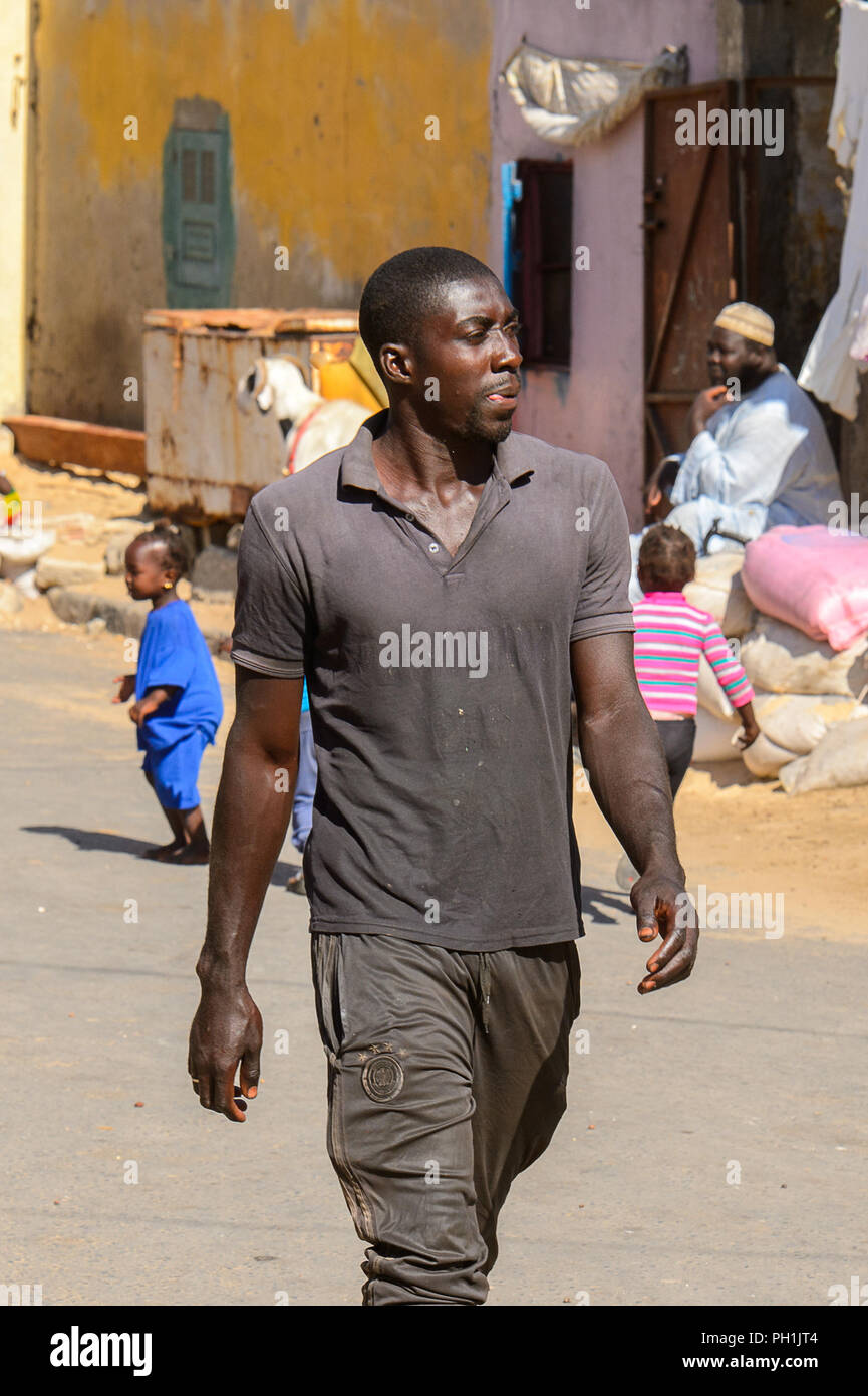 SAINT LOUIS, SENEGAL - APR 24, 2017: Unidentified Senegalese man in ...
