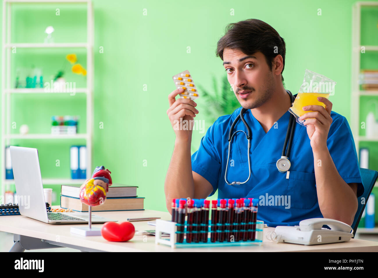 Doctor doing blood analysis in the lab Stock Photo - Alamy