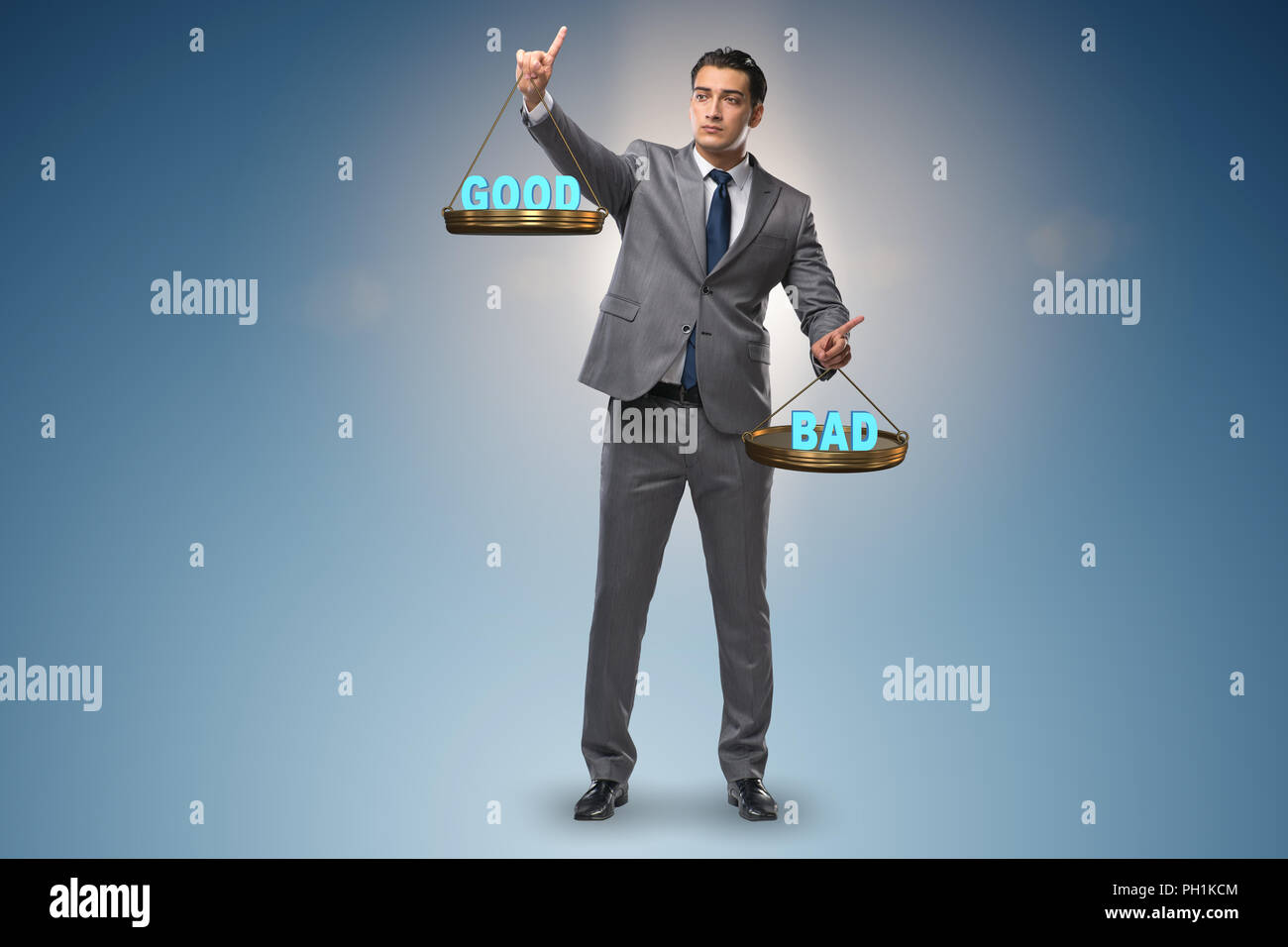 Businessman choosing between good and bad Stock Photo - Alamy