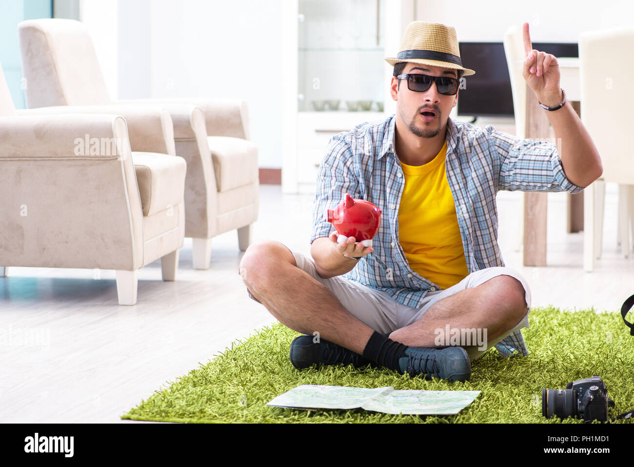 Man planning his travel with map Stock Photo - Alamy