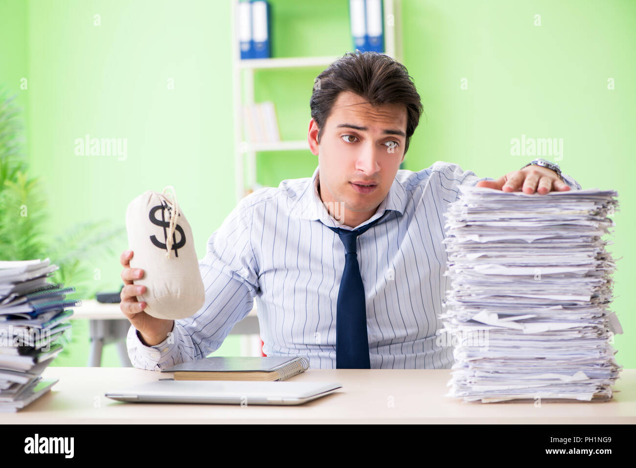 Workload and money hi-res stock photography and images - Alamy