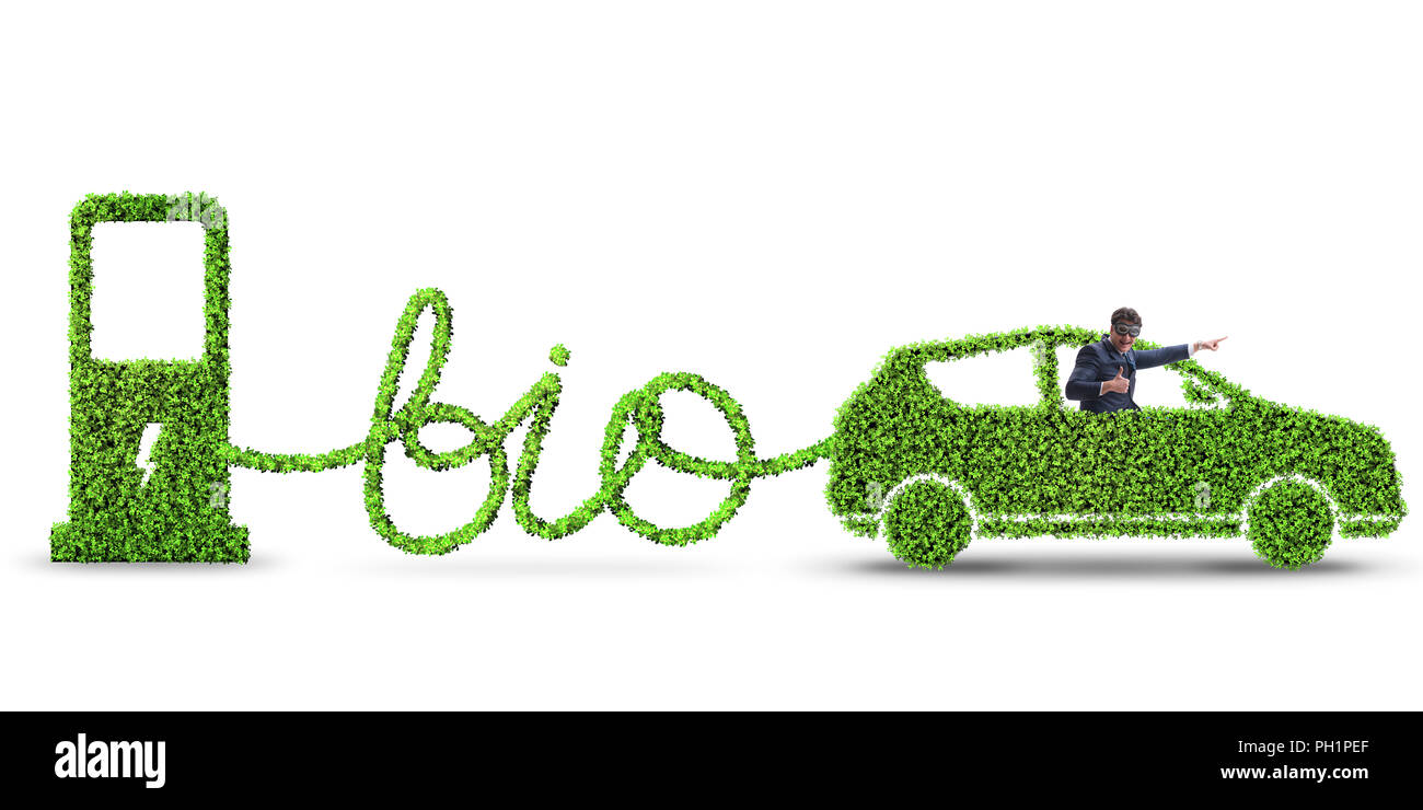 Businessman with car powered with biofuel Stock Photo - Alamy