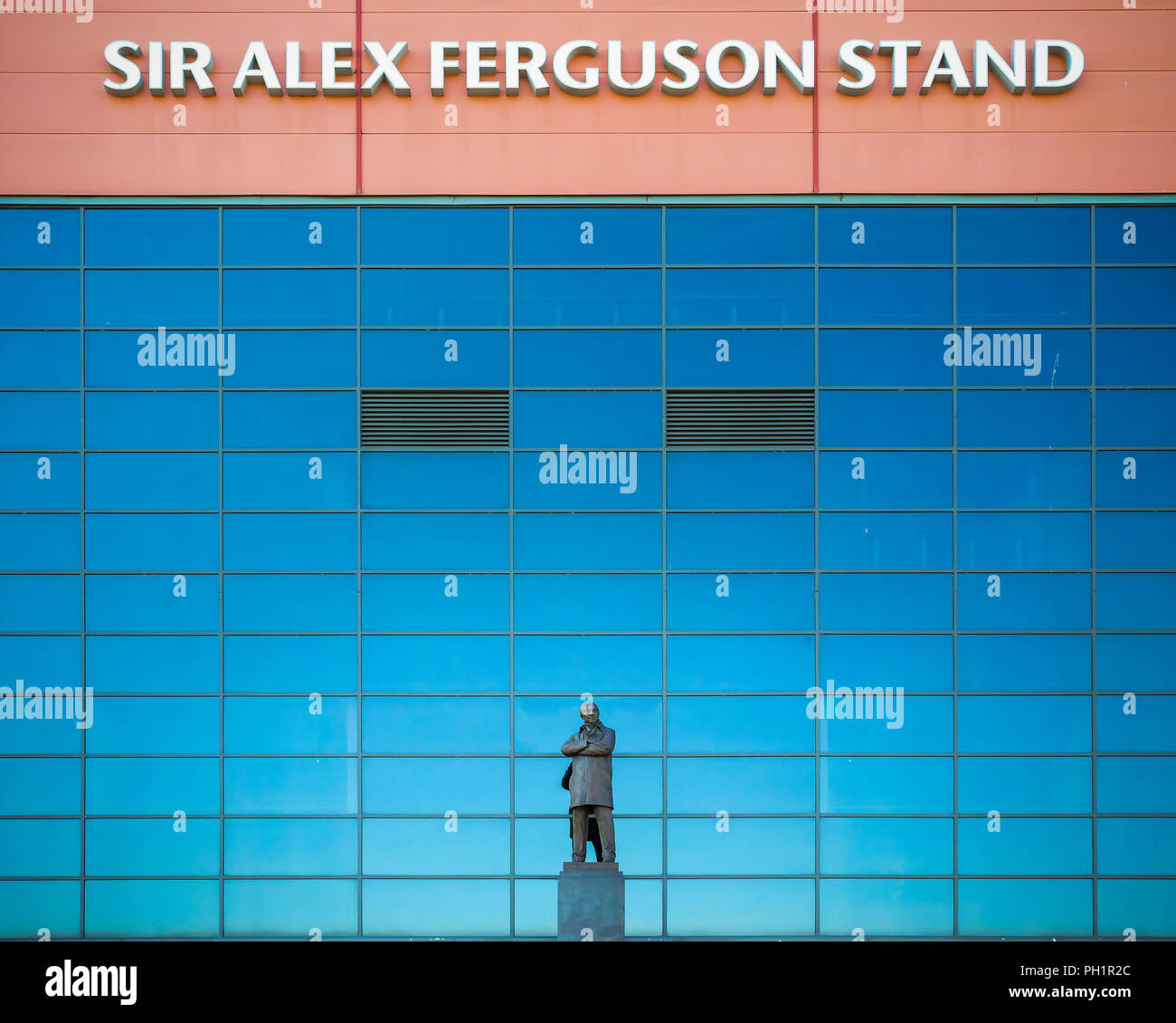 MANCHESTER, UK - MAY 19 2018: Sir Alex Ferguson Bronze statue in front ...