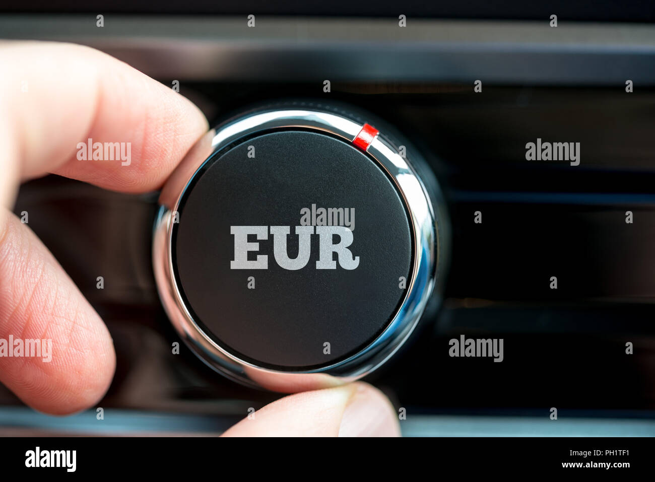 Hand turning dial hi-res stock photography and images - Alamy