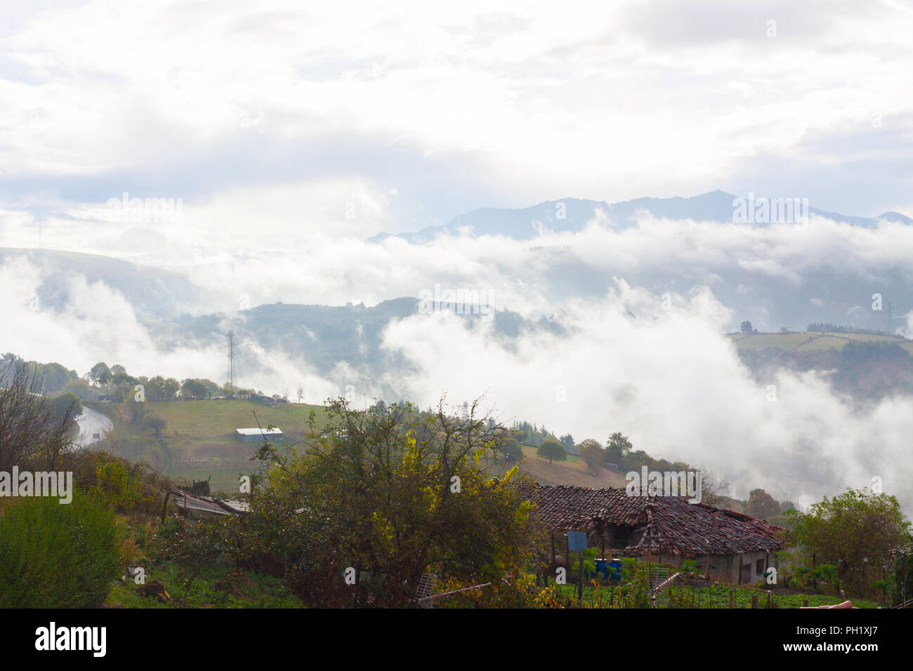 Low clouds and fog in the mountains in Tineo, Asturias, Spain Stock ...