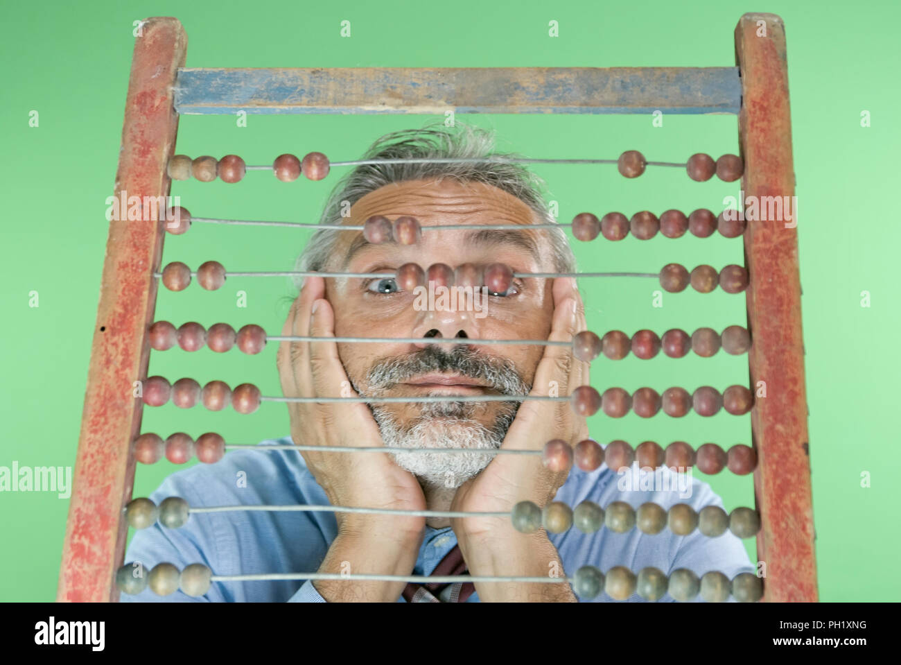 thoughtful accountant and out of focus abacus, financial concept Stock ...