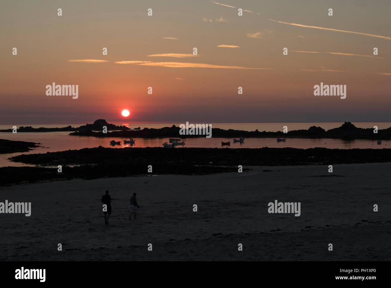 Sunset at Cobo Bay, Guernsey, Channel Islands Stock Photo - Alamy