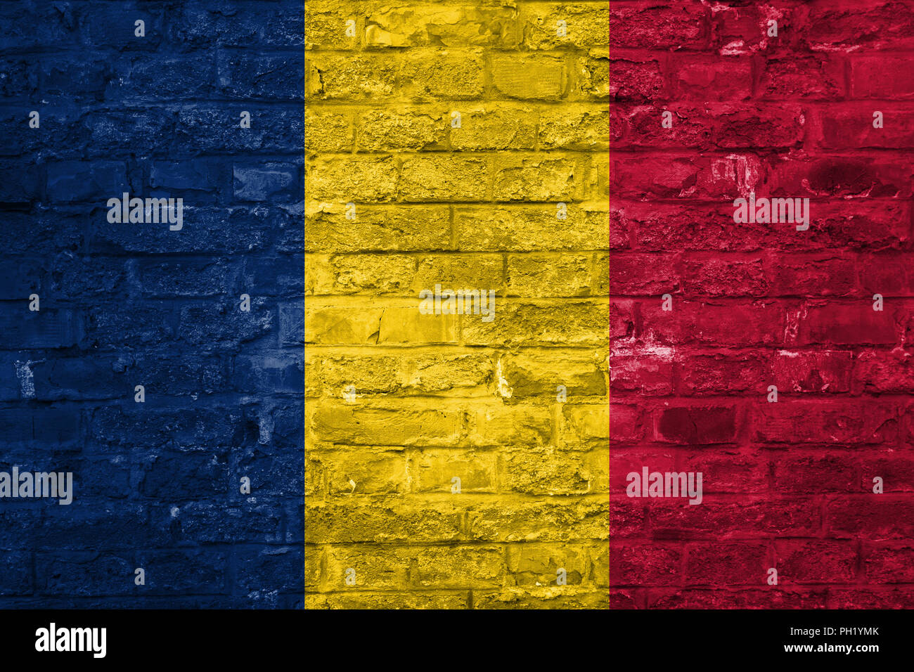 Flag of Chad over an old brick wall background, surface Stock Photo - Alamy