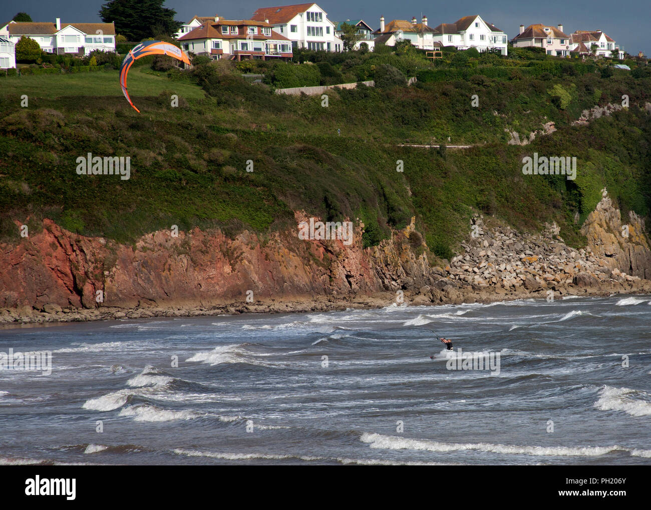Wind surfer near Long Quarry Point Torquay UK Stock Photo - Alamy