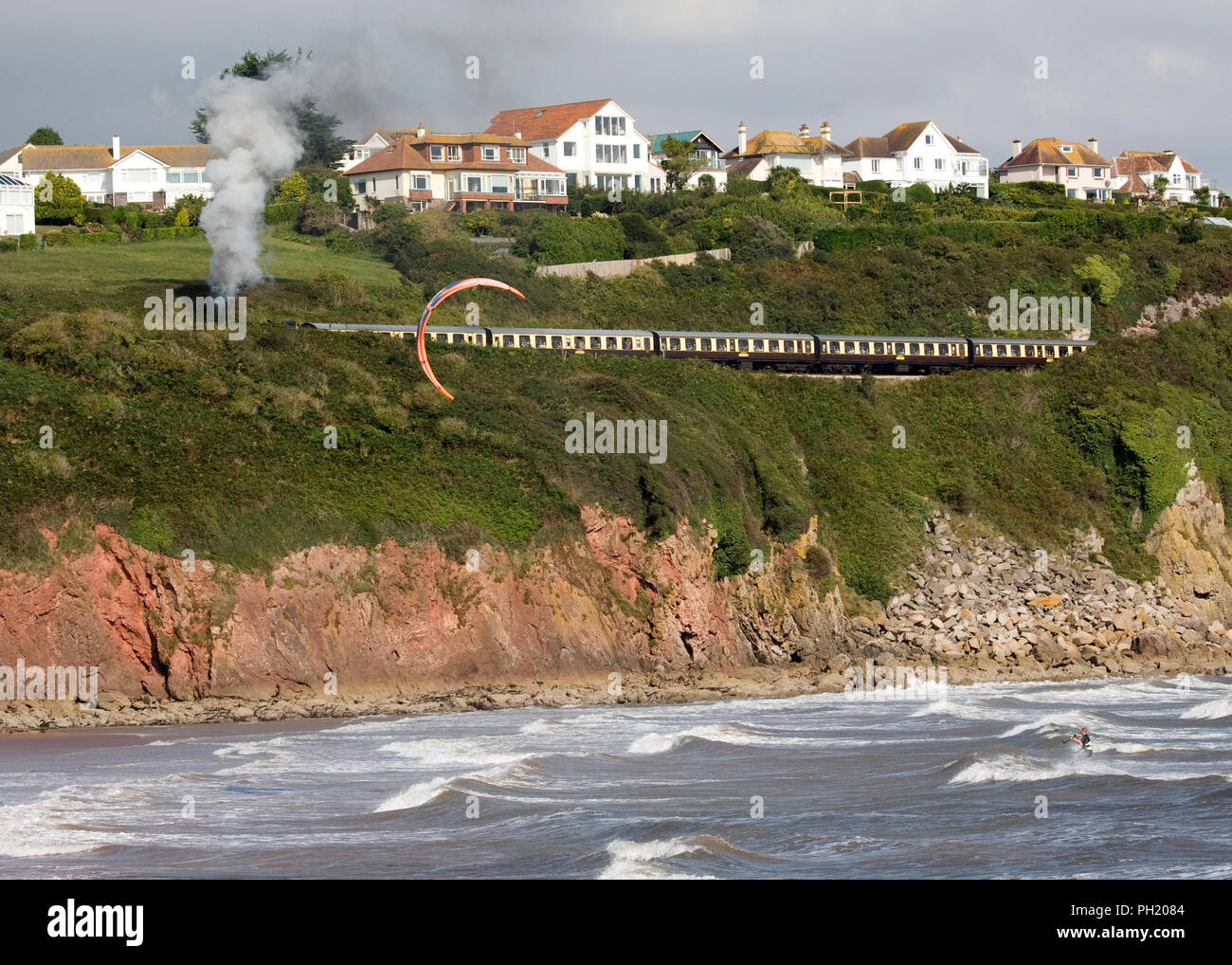 Wind surfer near Long Quarry Point Torquay UK Stock Photo - Alamy