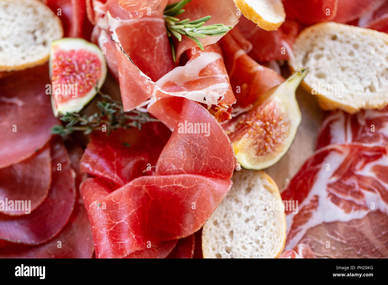 Light Italian snacks. A buffet table at a dinner party. Food tray with ...