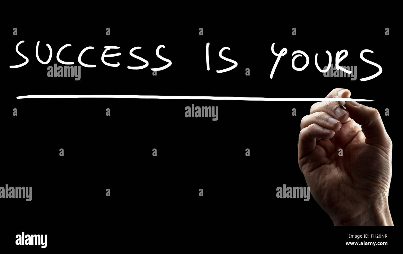 Conceptual close-up of a male hand underlining the motivational ...