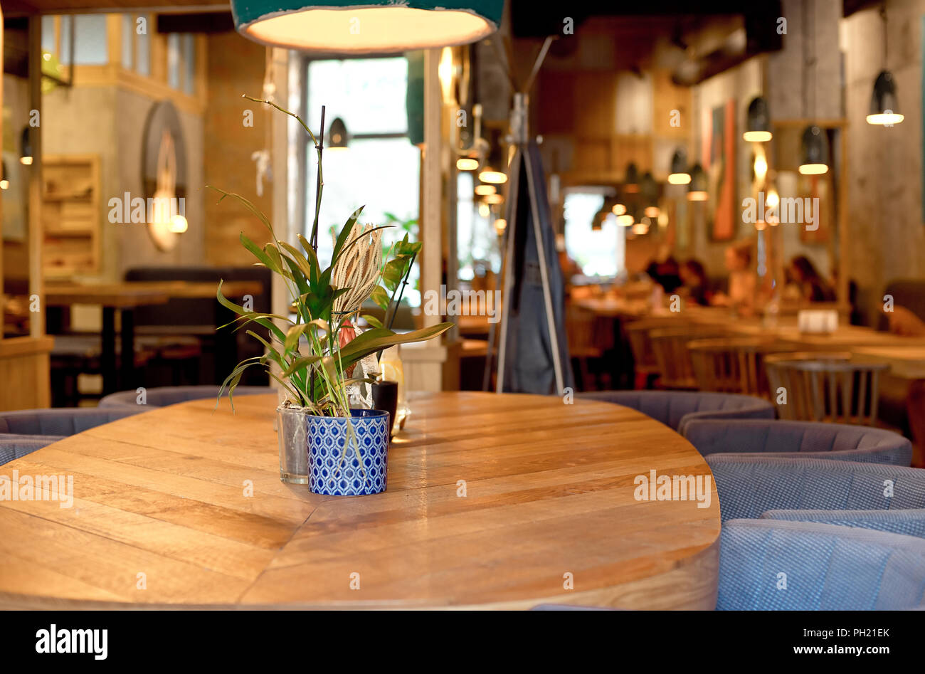 Modern loft style cafe interior in warm colors Stock Photo - Alamy