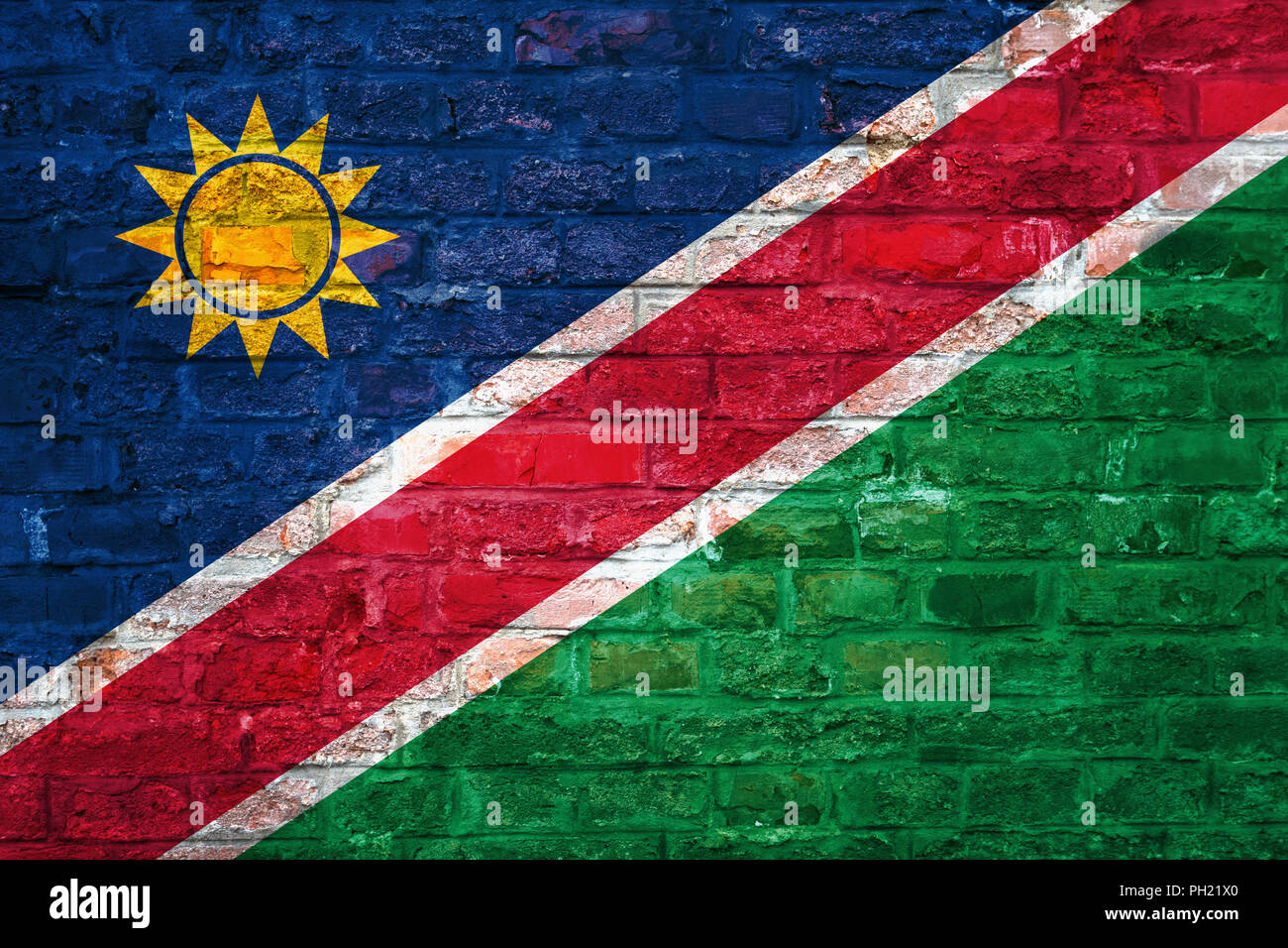 Flag of Namibia over an old brick wall background, surface Stock Photo ...