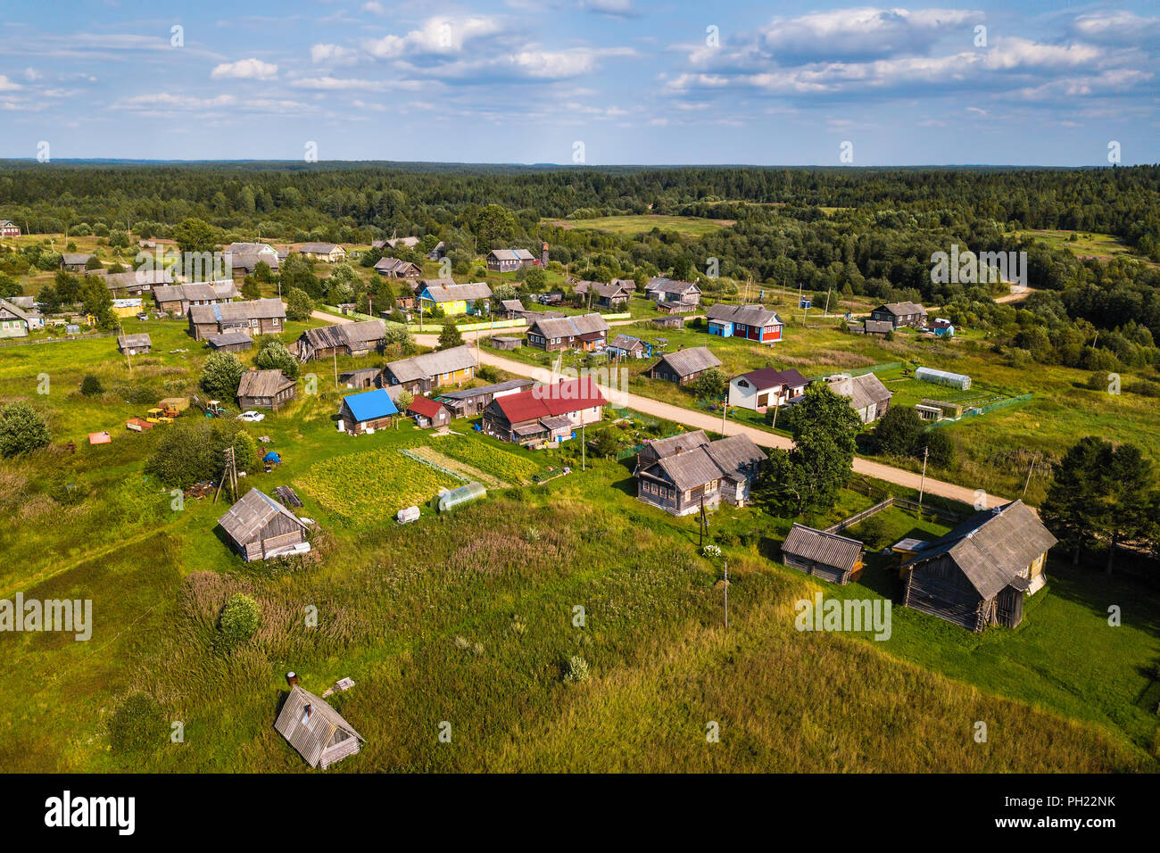 Bird's eye view of Ladva village, green fields and Vepsian forest ...