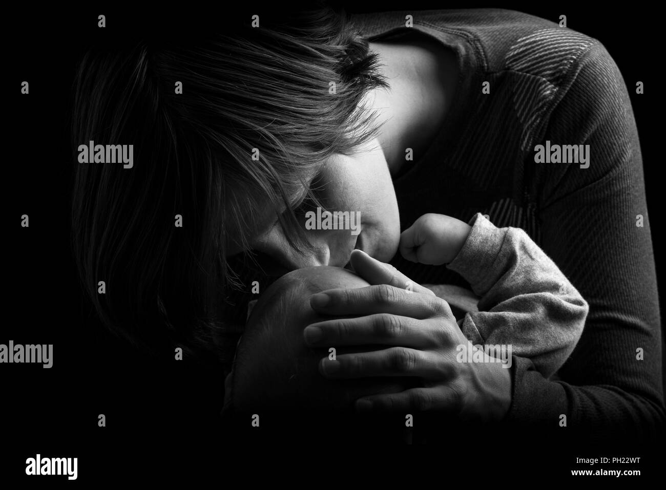 Black and White Image of Mother Tenderly Nuzzling and Touching Baby ...