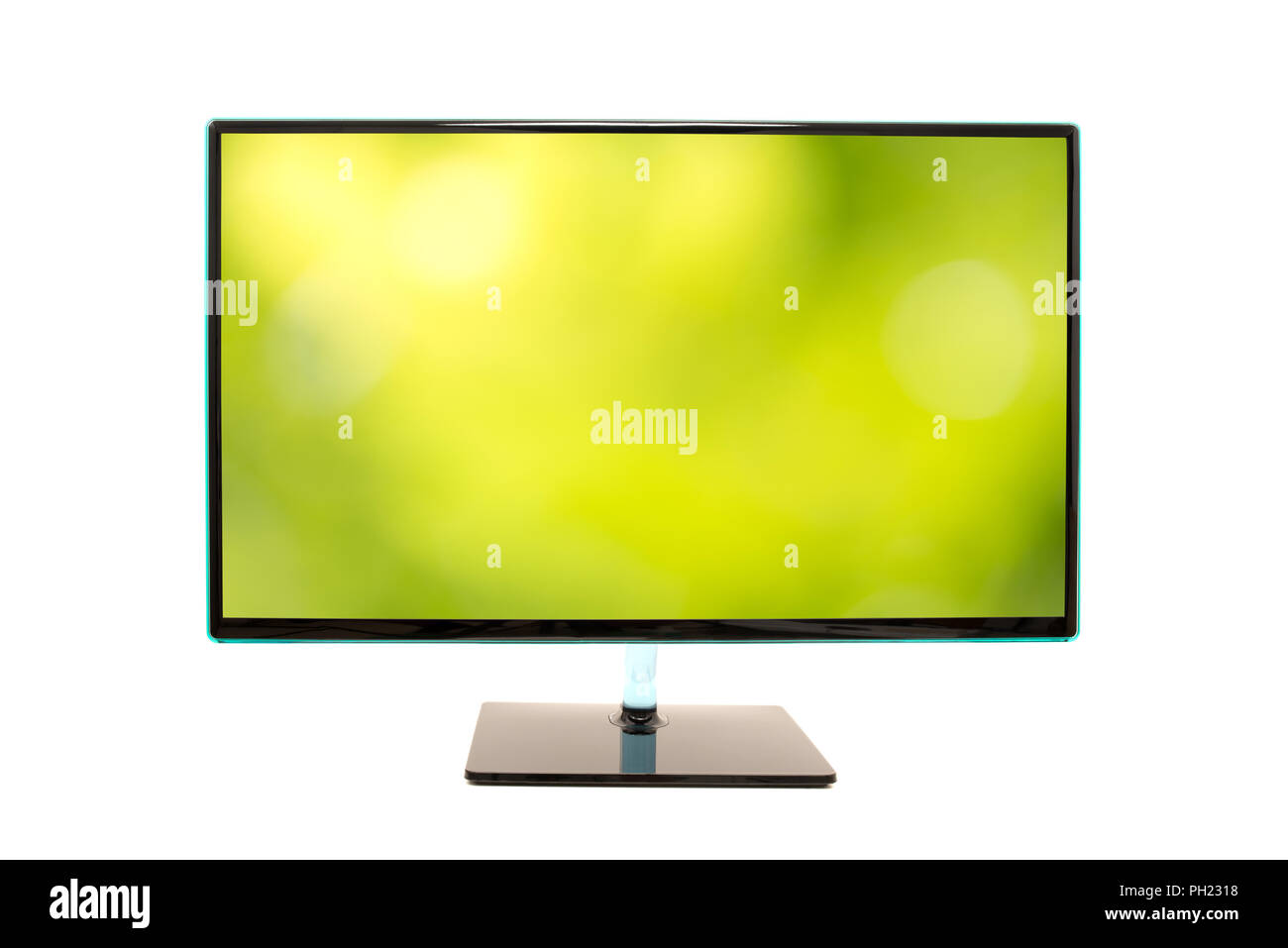 Computer monitor with an image of a blurred green natural background on ...