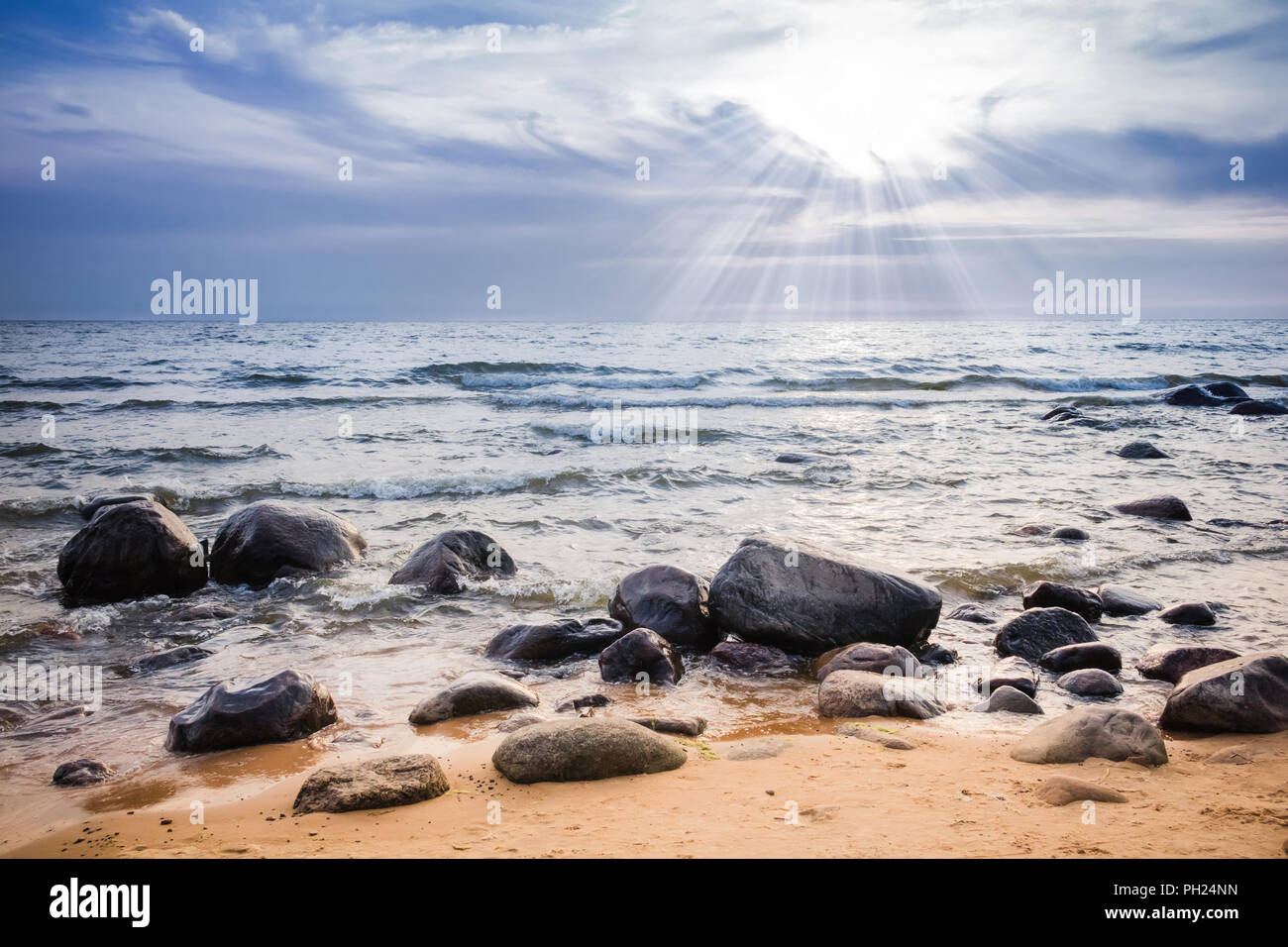 Sunset over rocky coastline hi-res stock photography and images - Alamy