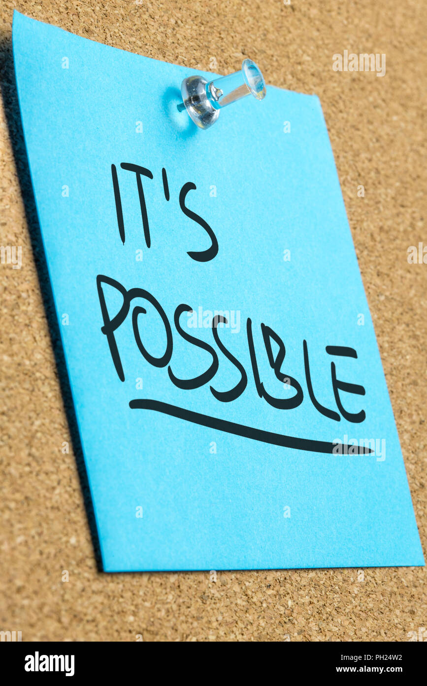It's possible sign on blue post it paper pinned on cork bulletin board ...