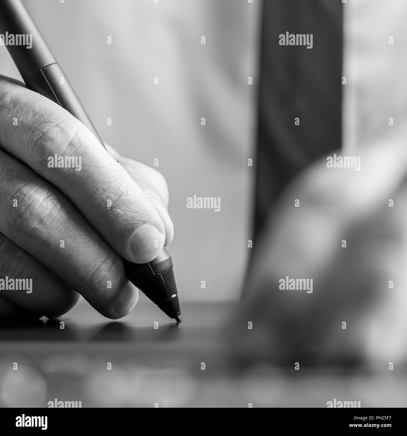 Using tablet pen Black and White Stock Photos & Images - Alamy