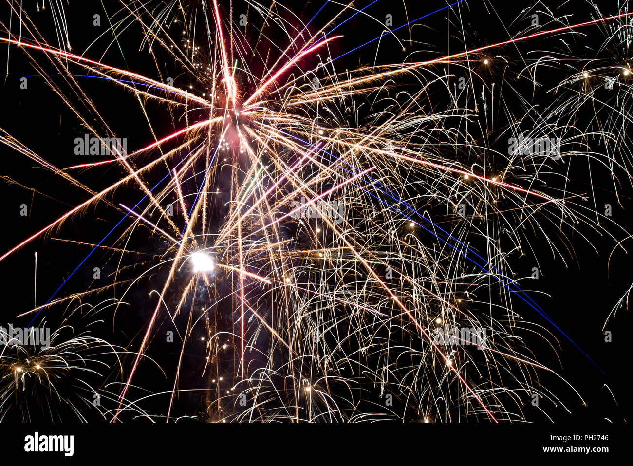 Detail of colorful fireworks in the night sky Stock Photo - Alamy