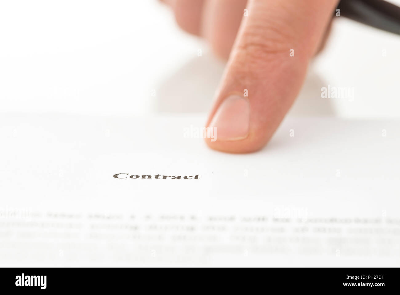 Closeup of male finger pointing at contract Stock Photo - Alamy