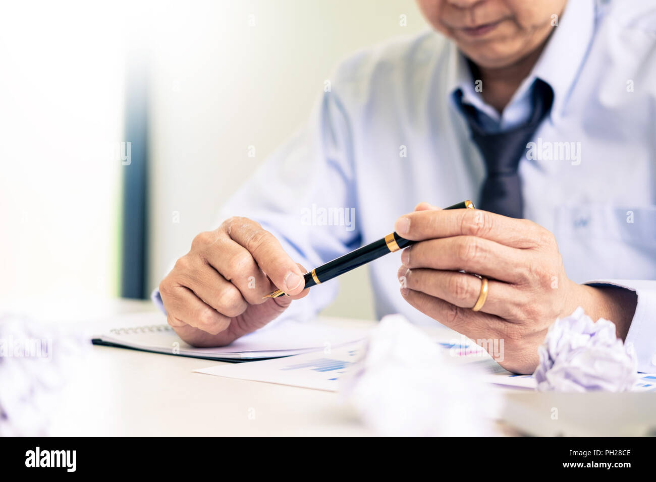 Depressed failure and tired businessman late sad and solving problem in ...