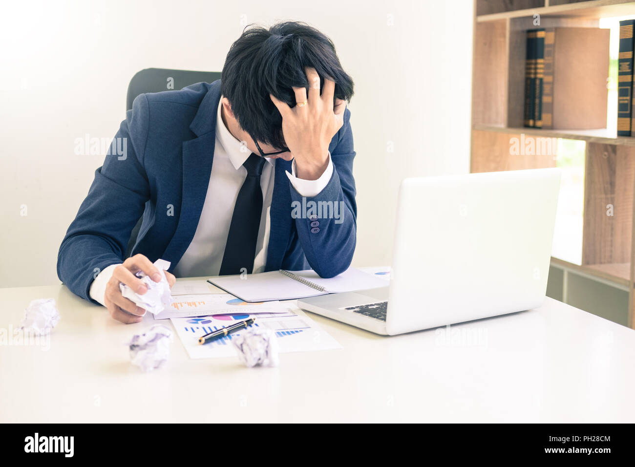 Depressed failure and tired businessman late sad and solving problem in ...