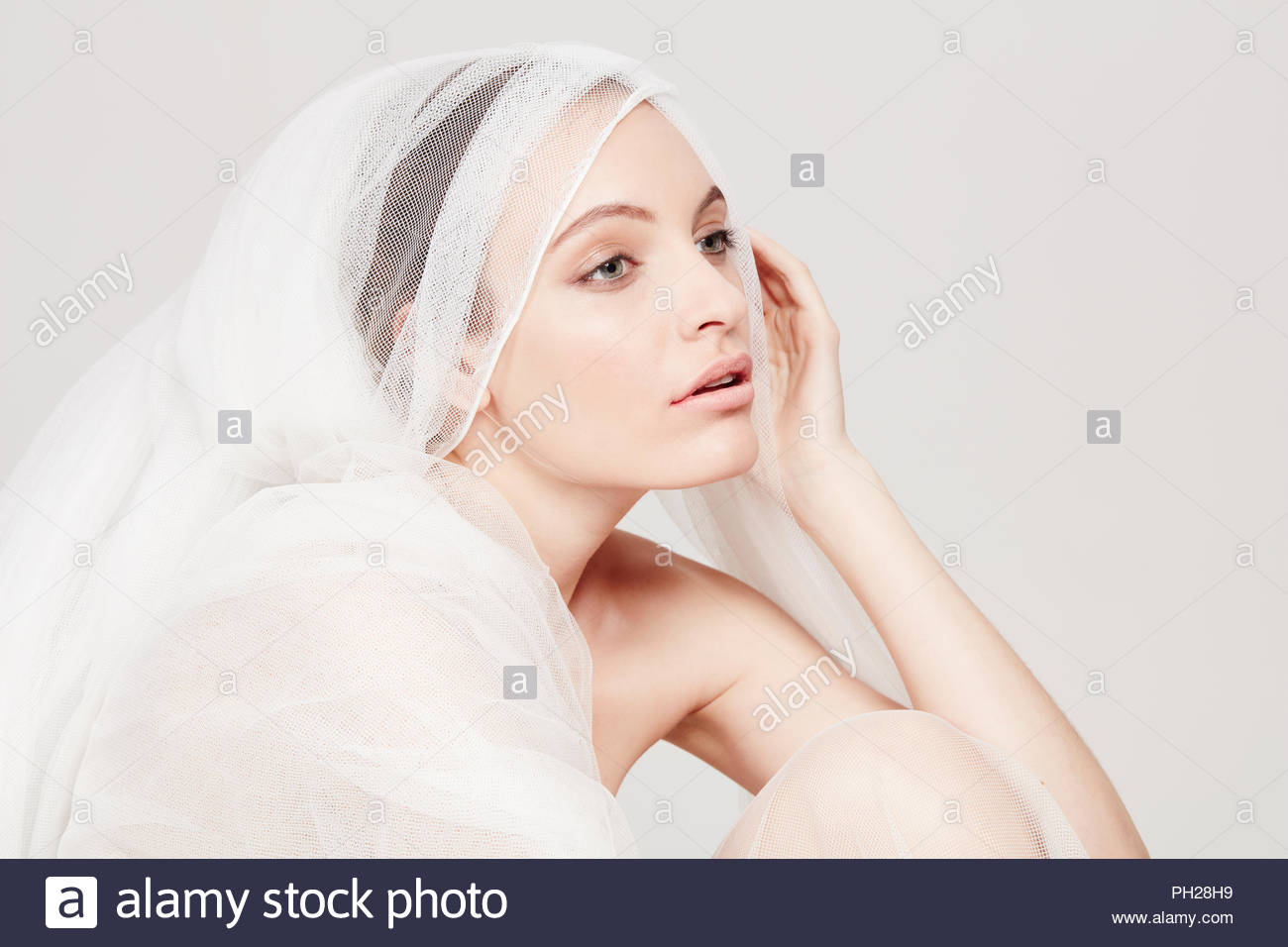 Young Woman Wrapped In Sheet High Resolution Stock Photography and ...