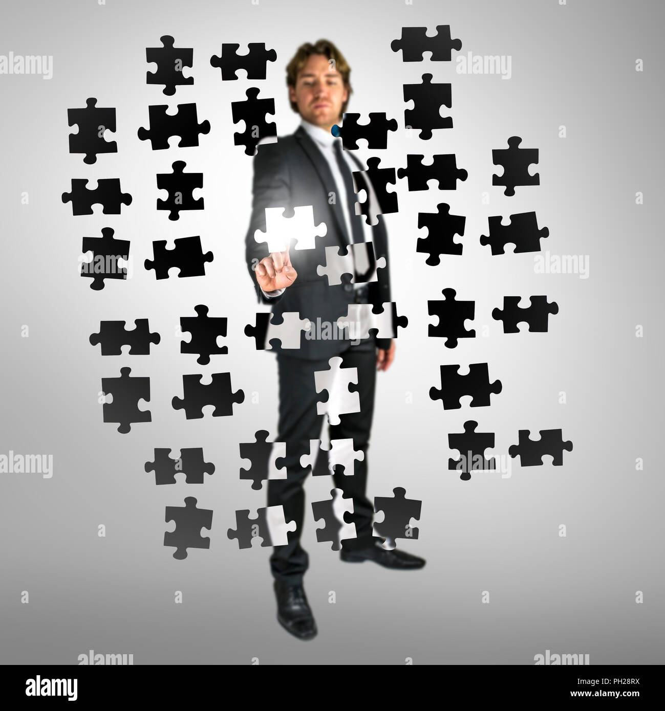 Searching for puzzle pieces hi-res stock photography and images - Alamy