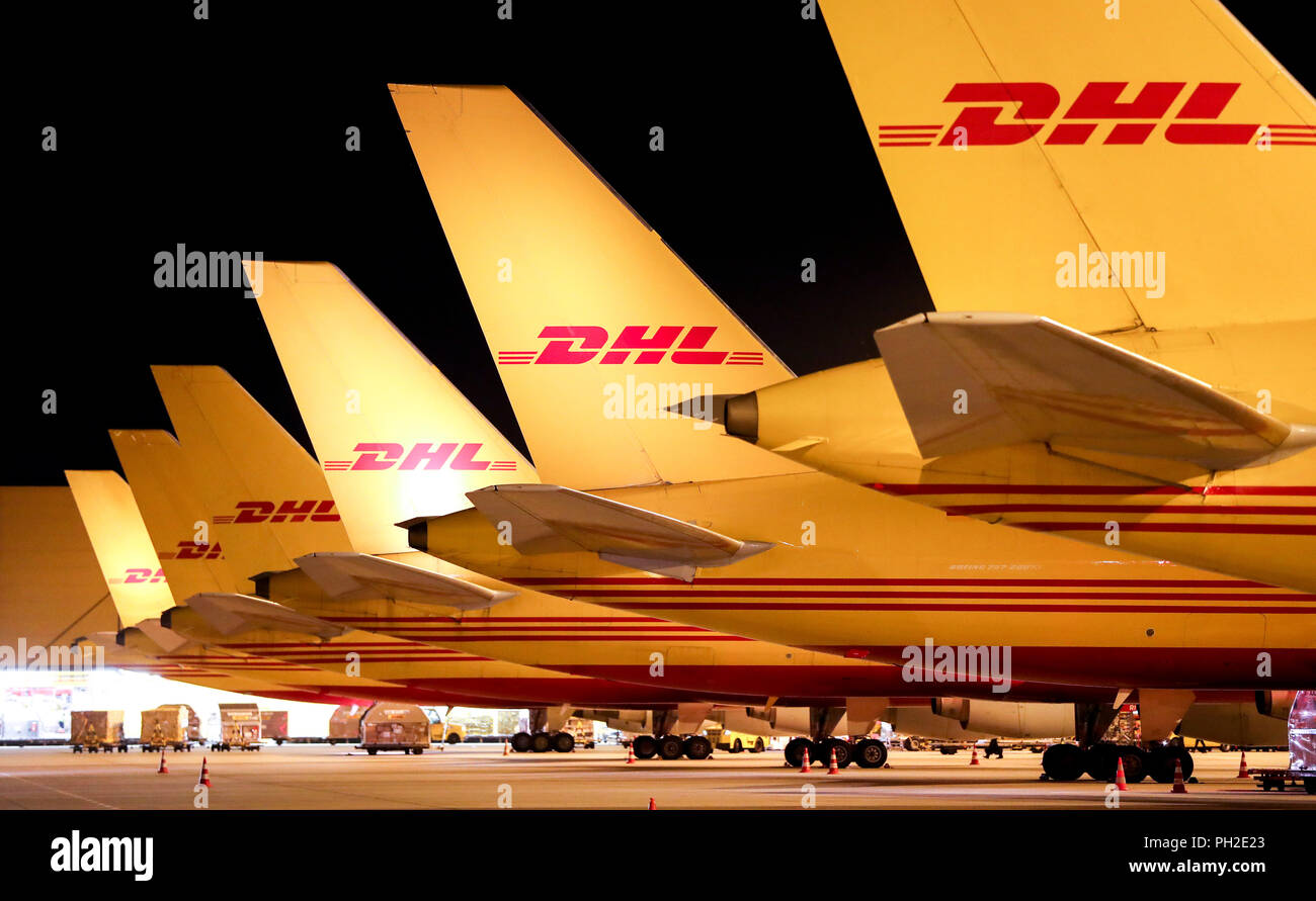 29 August 2018, Schkeuditz, Germany: DHL cargo aircraft are unloaded at ...