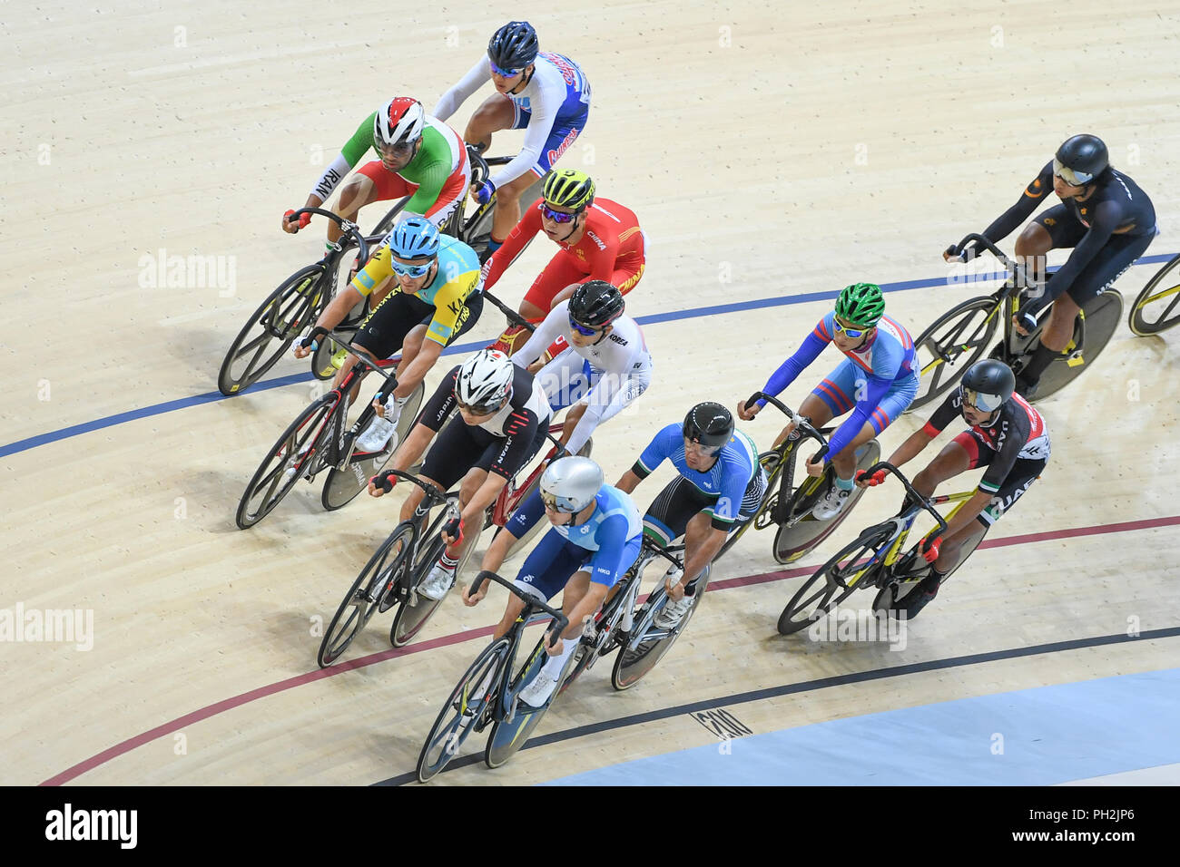 Jakarta, Indonesia. 30th Aug, 2018. Cyclists compete during the cycling ...