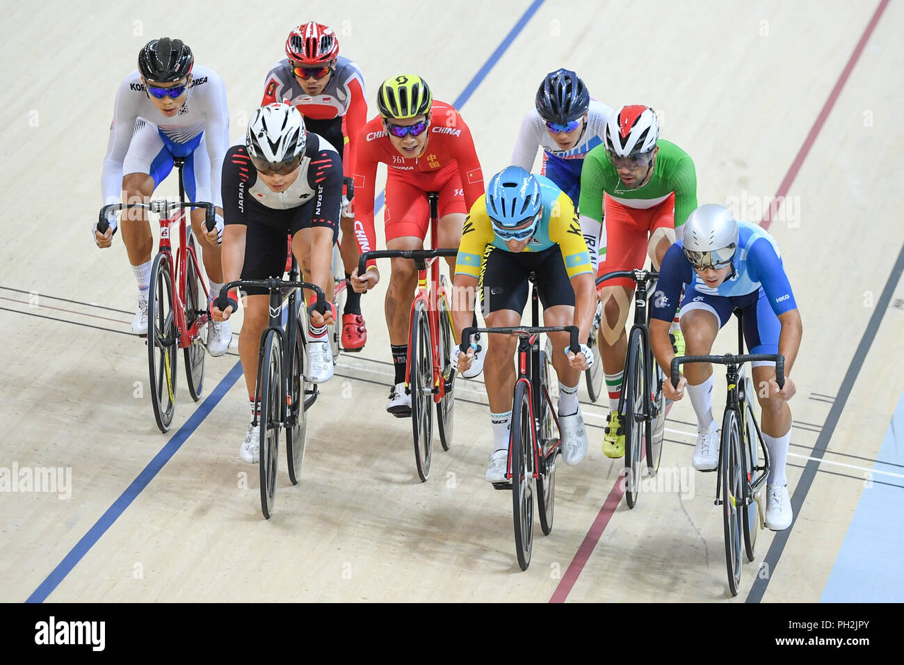 Jakarta, Indonesia. 30th Aug, 2018. Cyclists compete during the cycling ...