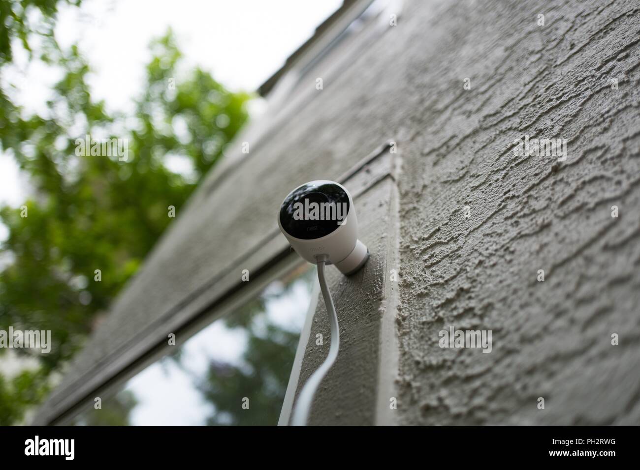 Low-angle view of weatherproof outdoor Nest home surveillance camera ...