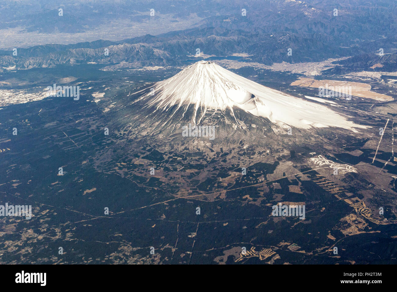 Mt Fuji seen from the air over Shizuoka Prefecture Japan on 02 Feb 2015 ...
