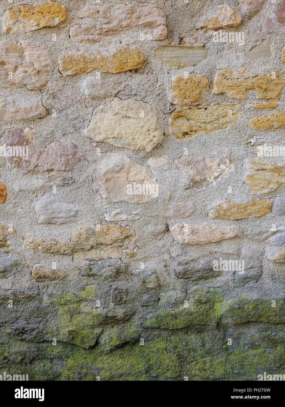 Rough stone wall texture background Stock Photo - Alamy