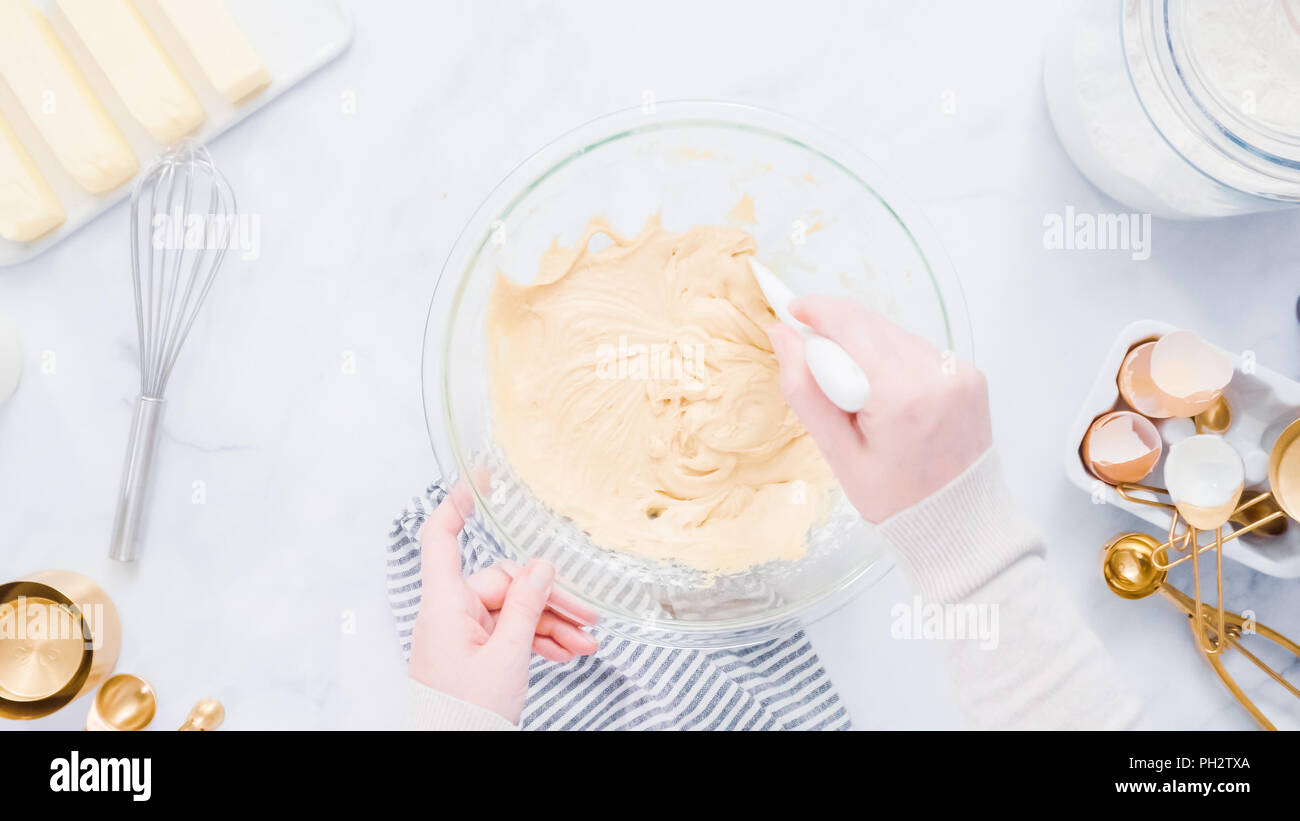 Step by step. Mixing ingredients for vanilla cupcakes Stock Photo - Alamy