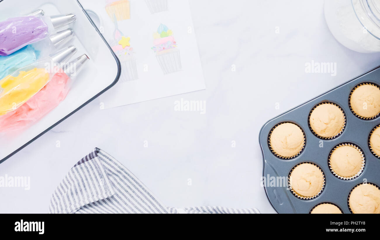 Step by step. Freshly bakes vanilla cupcakes Stock Photo - Alamy