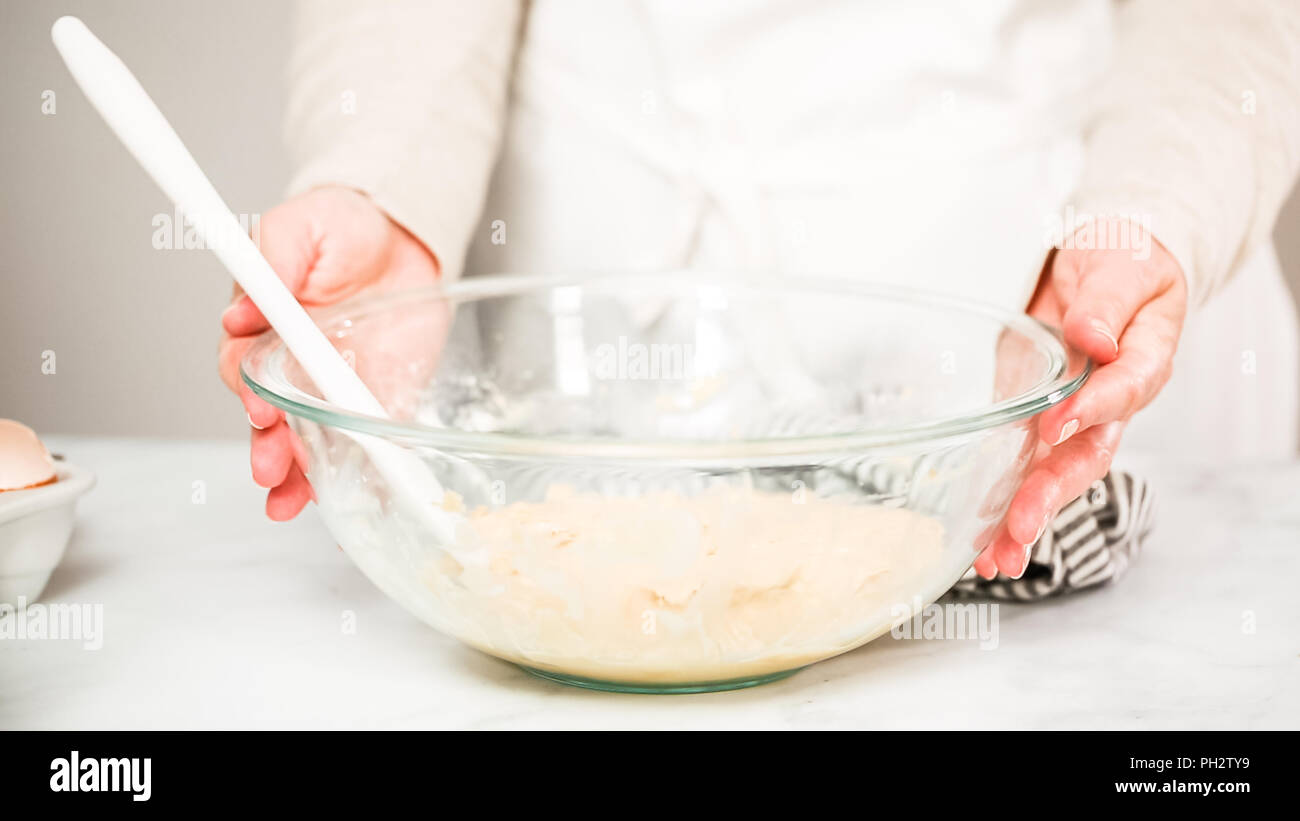 Step by step. Mixing ingredients for vanilla cupcakes Stock Photo - Alamy