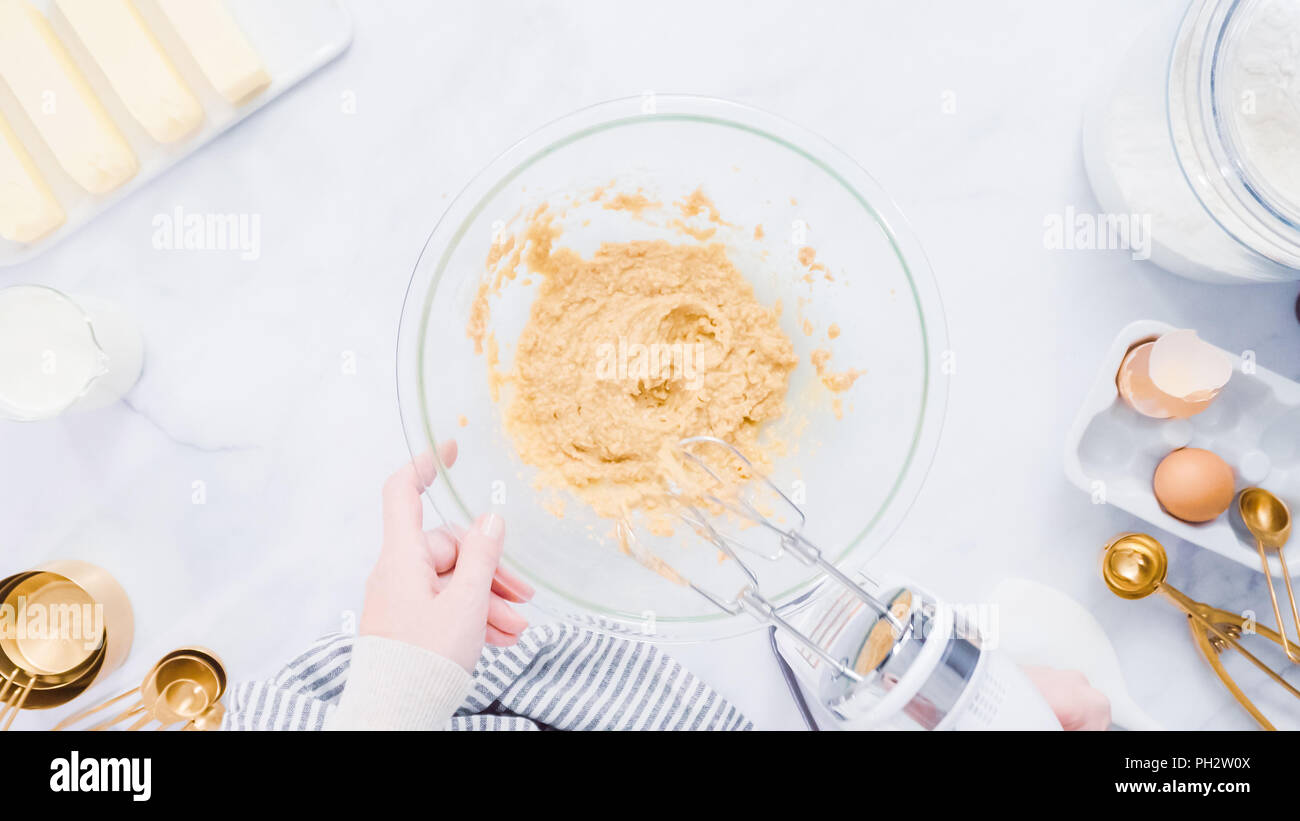 Step by step. Mixing ingredients for vanilla cupcakes Stock Photo - Alamy