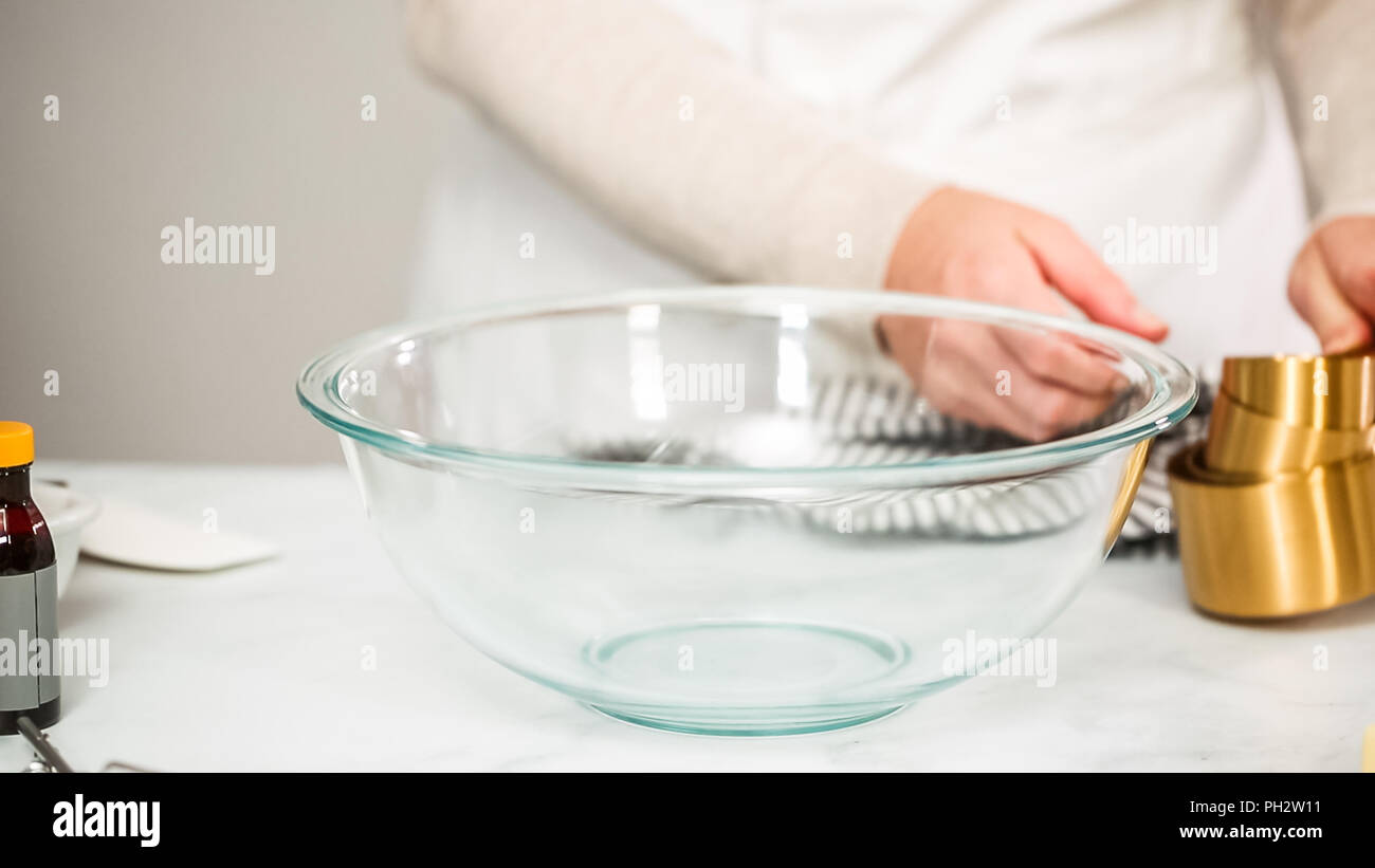 Step by step. Mixing ingredients for vanilla cupcakes Stock Photo - Alamy