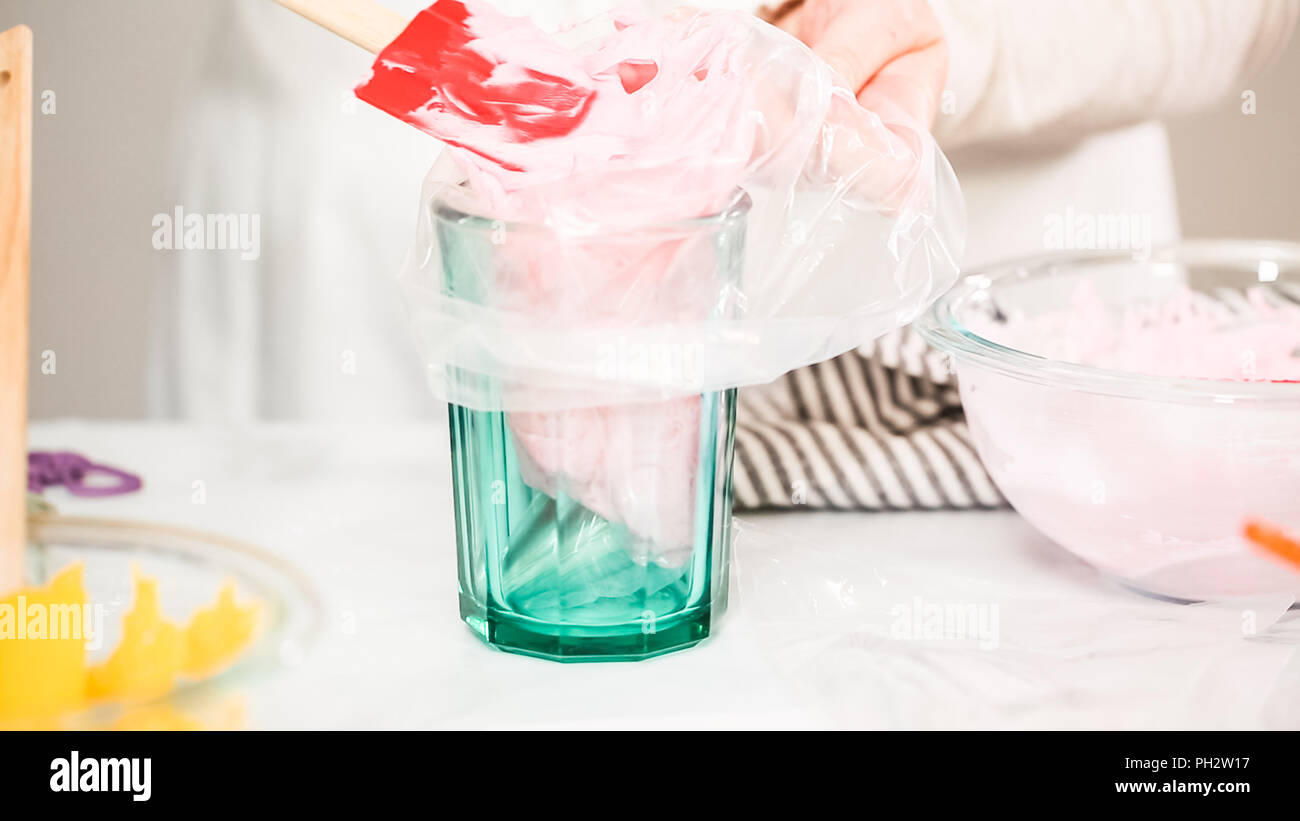 Step by step. Preparing piping bags with colorful buttercream frosting ...