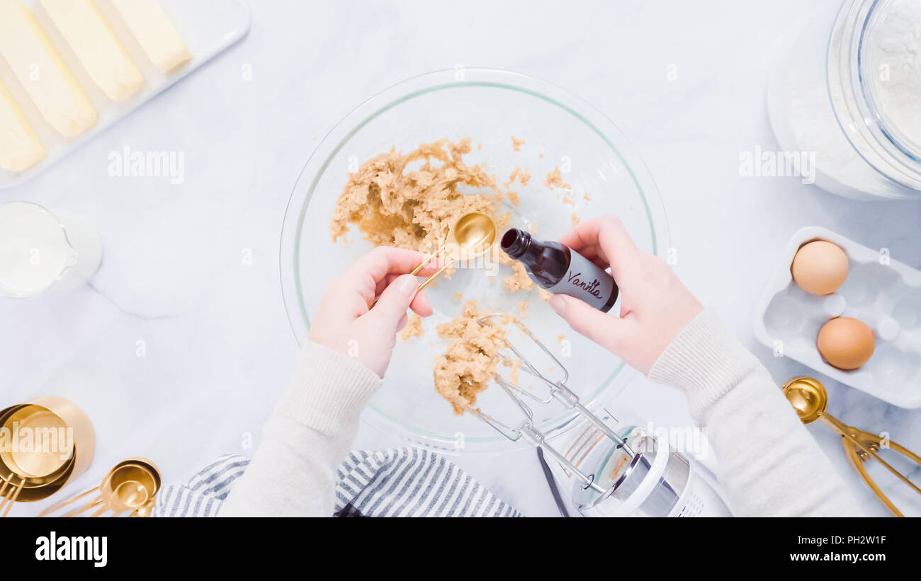 Step by step. Mixing ingredients for vanilla cupcakes Stock Photo - Alamy