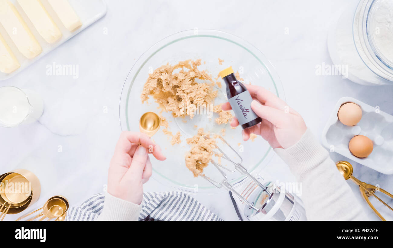 Step by step. Mixing ingredients for vanilla cupcakes Stock Photo - Alamy