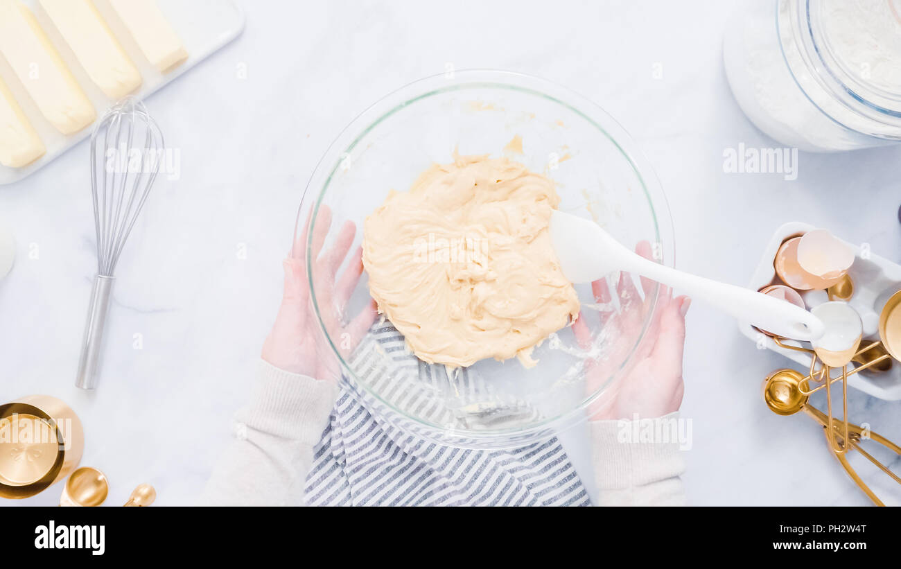 Step by step. Mixing ingredients for vanilla cupcakes Stock Photo - Alamy