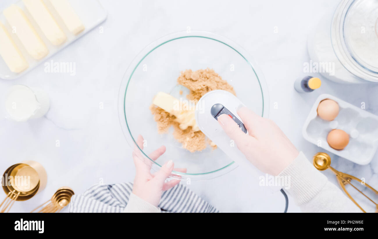 Step by step. Mixing ingredients for vanilla cupcakes Stock Photo - Alamy
